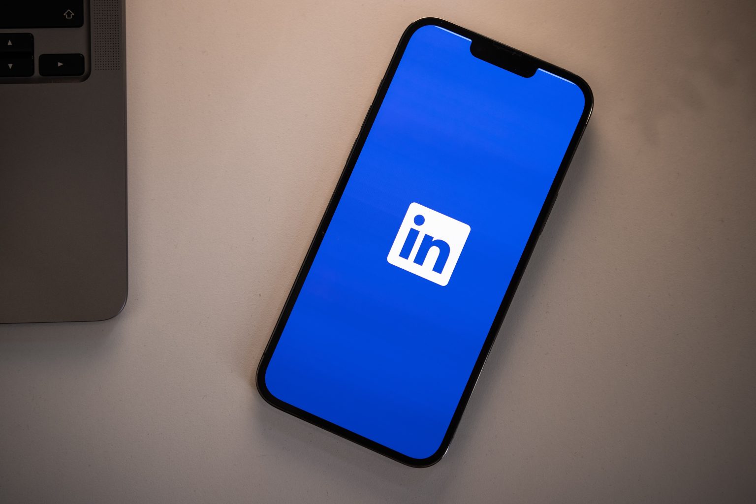 How to repost on LinkedIn